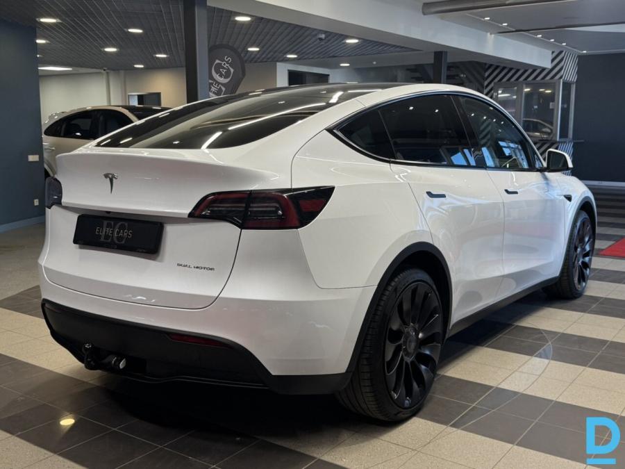 White Tesla Model Y 2022 in Marupe, with an engine capacity of 0.00 L and mileage of 101 thousand km for 31990 €, photo 3 on AUTOMOTO.COM.LV