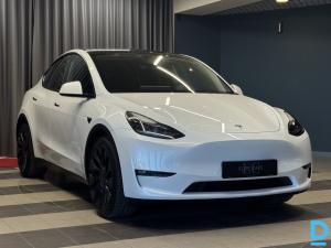 White Tesla Model Y 2022 in Marupe, with an engine capacity of 0.00 L and mileage of 101 thousand km for 31990 €, photo 4 on AUTOMOTO.COM.LV