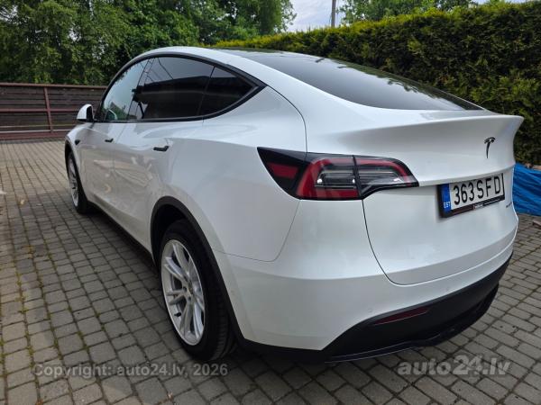 Balts Tesla Model Y 2022 Tallina, ar dzinēja tilpumu 0.00 L un nobraukumu 83 tūkst. km par 33000 €, foto 4 vietnē AUTOMOTO.COM.LV