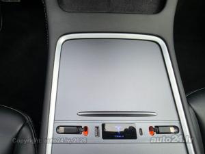 White Tesla Model Y 2022 in Tallinn, with an engine capacity of 0.00 L and mileage of 83 thousand km for 33000 €, photo 7 on AUTOMOTO.COM.LV