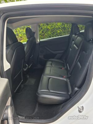 White Tesla Model Y 2022 in Tallinn, with an engine capacity of 0.00 L and mileage of 83 thousand km for 33000 €, photo 10 on AUTOMOTO.COM.LV
