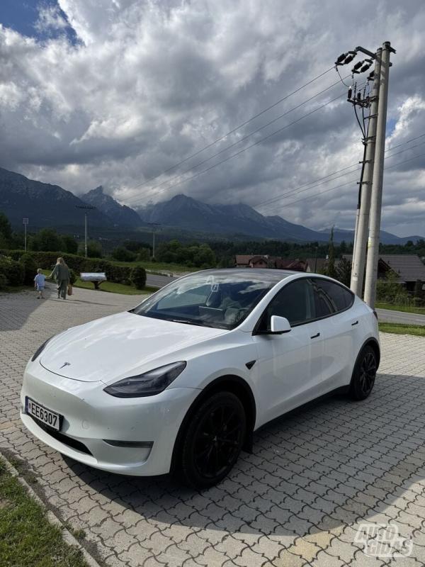 Balts Tesla Model Y 2022 Klaipėda, ar dzinēja tilpumu 0.00 L un nobraukumu 69 tūkst. km par 28900 €, foto  vietnē AUTOMOTO.COM.LV