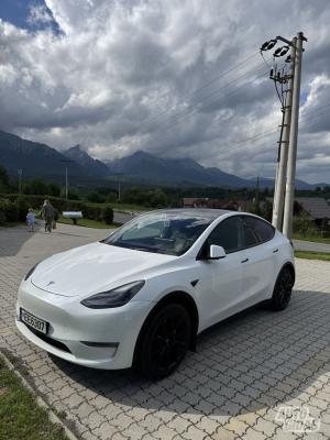 Balts Tesla Model Y 2022 Klaipėda, ar dzinēja tilpumu 0.00 L un nobraukumu 69 tūkst. km par 28900 €, foto  vietnē AUTOMOTO.COM.LV