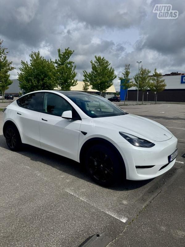 Balts Tesla Model Y 2022 Klaipėda, ar dzinēja tilpumu 0.00 L un nobraukumu 69 tūkst. km par 28900 €, foto 4 vietnē AUTOMOTO.COM.LV