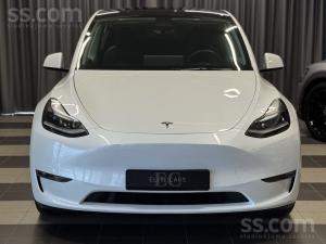White Tesla Model Y 2022 in Riga, with an engine capacity of 0.00 L and mileage of 105 thousand km for 32990 €, photo 3 on AUTOMOTO.COM.LV