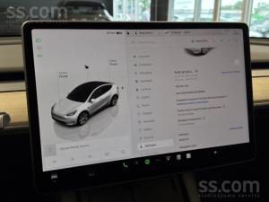 White Tesla Model Y 2022 in Riga, with an engine capacity of 0.00 L and mileage of 105 thousand km for 32990 €, photo 11 on AUTOMOTO.COM.LV