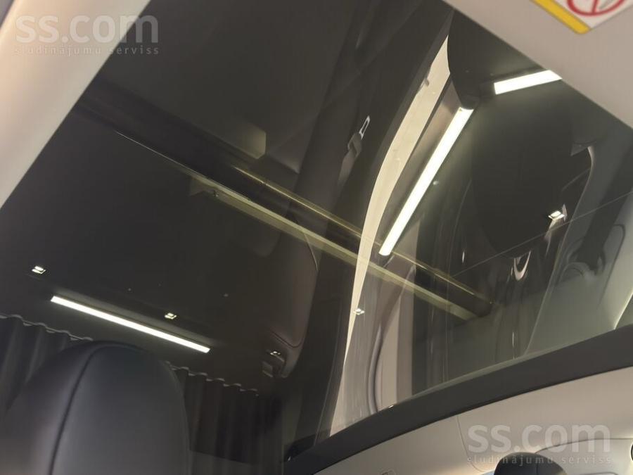 White Tesla Model Y 2022 in Riga, with an engine capacity of 0.00 L and mileage of 105 thousand km for 32990 €, photo 23 on AUTOMOTO.COM.LV