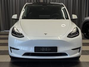 Balts Tesla Model Y 2022 Rīga, ar dzinēja tilpumu 0.00 L un nobraukumu 105 tūkst. km par 32990 €, foto  vietnē AUTOMOTO.COM.LV