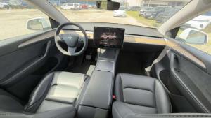 White Tesla Model Y 2022 in Siauliai, with an engine capacity of 0.00 L and mileage of 97 thousand km for 25350 €, photo 11 on AUTOMOTO.COM.LV