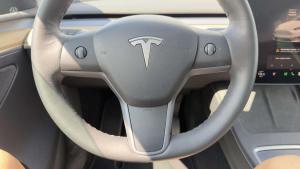 White Tesla Model Y 2022 in Siauliai, with an engine capacity of 0.00 L and mileage of 97 thousand km for 25350 €, photo 13 on AUTOMOTO.COM.LV