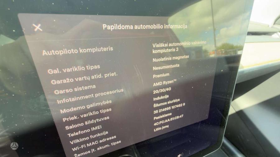 White Tesla Model Y 2022 in Siauliai, with an engine capacity of 0.00 L and mileage of 97 thousand km for 25350 €, photo 15 on AUTOMOTO.COM.LV