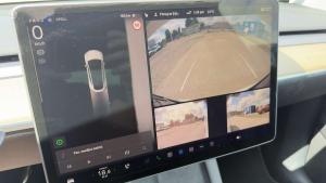 White Tesla Model Y 2022 in Siauliai, with an engine capacity of 0.00 L and mileage of 97 thousand km for 25350 €, photo 21 on AUTOMOTO.COM.LV