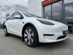 White Tesla Model Y 2022 in Riga, with an engine capacity of 0.00 L and mileage of 114 thousand km for 32300 €, photo  on AUTOMOTO.COM.LV