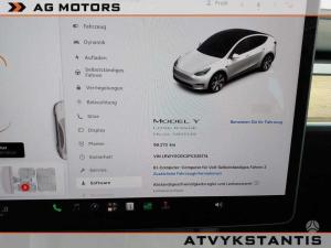 White Tesla Model Y 2022 in Vilnius, with an engine capacity of 0.00 L and mileage of 99 thousand km for 33900 €, photo 7 on AUTOMOTO.COM.LV