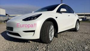 White Tesla Model Y 2022 in Siauliai, with an engine capacity of 0.00 L and mileage of 97 thousand km for 24650 €, photo  on AUTOMOTO.COM.LV