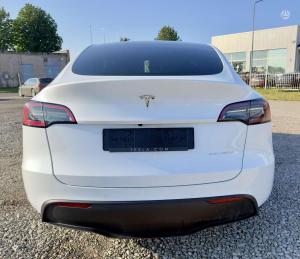 White Tesla Model Y 2022 in Siauliai, with an engine capacity of 0.00 L and mileage of 97 thousand km for 24650 €, photo 7 on AUTOMOTO.COM.LV