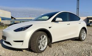 White Tesla Model Y 2022 in Siauliai, with an engine capacity of 0.00 L and mileage of 97 thousand km for 24650 €, photo 10 on AUTOMOTO.COM.LV