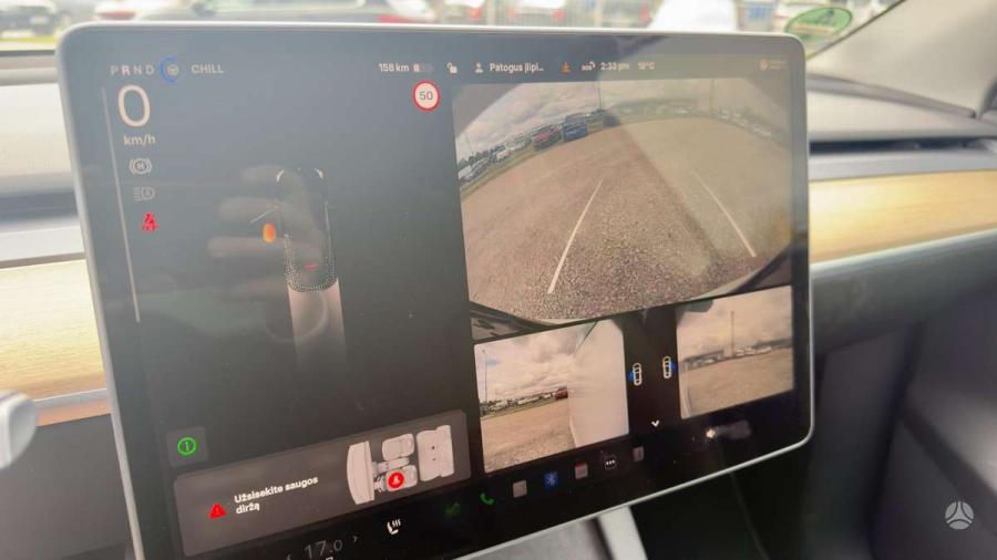 White Tesla Model Y 2022 in Siauliai, with an engine capacity of 0.00 L and mileage of 97 thousand km for 24650 €, photo 20 on AUTOMOTO.COM.LV