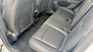 White Tesla Model Y 2022 in Siauliai, with an engine capacity of 0.00 L and mileage of 97 thousand km for 24650 €, photo 23 on AUTOMOTO.COM.LV