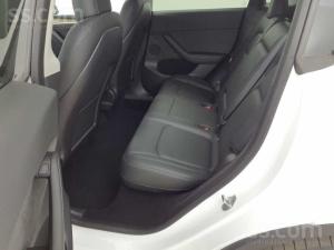 White Tesla Model Y 2022 in Riga, with an engine capacity of 0.00 L and mileage of 74 thousand km for 33990 €, photo 17 on AUTOMOTO.COM.LV