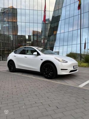 White Tesla Model Y 2022 in Vilnius, with an engine capacity of 0.00 L and mileage of 76 thousand km for 32500 €, photo 4 on AUTOMOTO.COM.LV