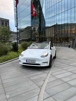 White Tesla Model Y 2022 in Vilnius, with an engine capacity of 0.00 L and mileage of 76 thousand km for 32500 €, photo 7 on AUTOMOTO.COM.LV