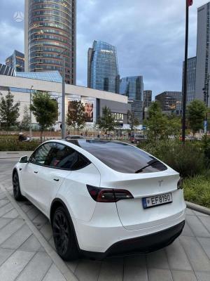 White Tesla Model Y 2022 in Vilnius, with an engine capacity of 0.00 L and mileage of 76 thousand km for 32500 €, photo 15 on AUTOMOTO.COM.LV