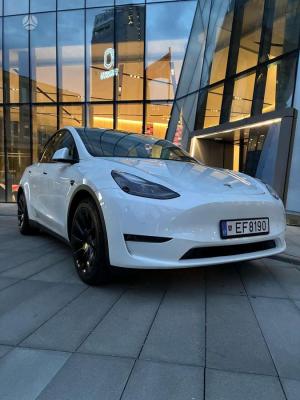 White Tesla Model Y 2022 in Vilnius, with an engine capacity of 0.00 L and mileage of 76 thousand km for 32500 €, photo 17 on AUTOMOTO.COM.LV