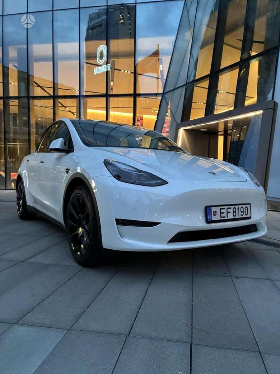 White Tesla Model Y 2022 in Vilnius, with an engine capacity of 0.00 L and mileage of 76 thousand km for 32500 €, photo 17 on AUTOMOTO.COM.LV