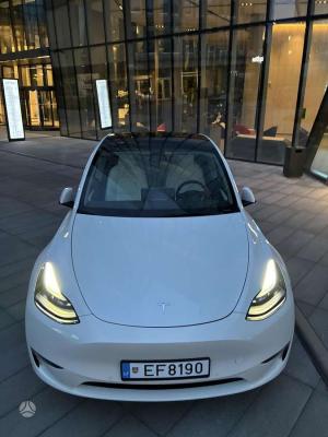 White Tesla Model Y 2022 in Vilnius, with an engine capacity of 0.00 L and mileage of 76 thousand km for 32500 €, photo 23 on AUTOMOTO.COM.LV