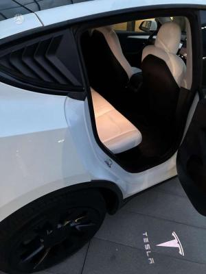 White Tesla Model Y 2022 in Vilnius, with an engine capacity of 0.00 L and mileage of 76 thousand km for 32500 €, photo 30 on AUTOMOTO.COM.LV