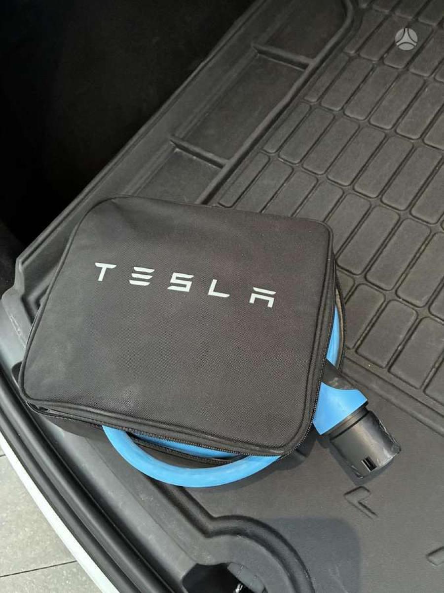 White Tesla Model Y 2022 in Vilnius, with an engine capacity of 0.00 L and mileage of 76 thousand km for 32500 €, photo 33 on AUTOMOTO.COM.LV