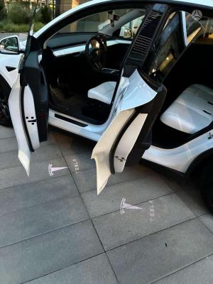 White Tesla Model Y 2022 in Vilnius, with an engine capacity of 0.00 L and mileage of 76 thousand km for 32500 €, photo 34 on AUTOMOTO.COM.LV