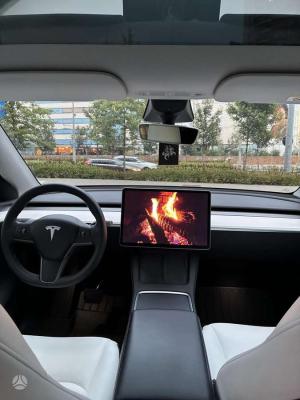 White Tesla Model Y 2022 in Vilnius, with an engine capacity of 0.00 L and mileage of 76 thousand km for 32500 €, photo 37 on AUTOMOTO.COM.LV
