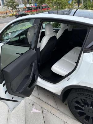 White Tesla Model Y 2022 in Vilnius, with an engine capacity of 0.00 L and mileage of 76 thousand km for 32500 €, photo 40 on AUTOMOTO.COM.LV