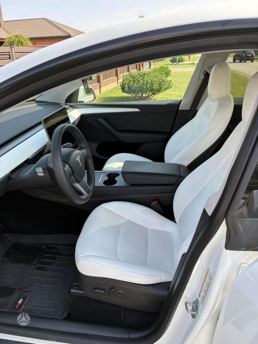White Tesla Model Y 2022 in Vilnius, with an engine capacity of 0.00 L and mileage of 76 thousand km for 32500 €, photo 45 on AUTOMOTO.COM.LV