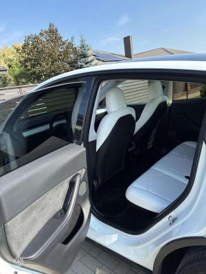 White Tesla Model Y 2022 in Vilnius, with an engine capacity of 0.00 L and mileage of 76 thousand km for 32500 €, photo 47 on AUTOMOTO.COM.LV
