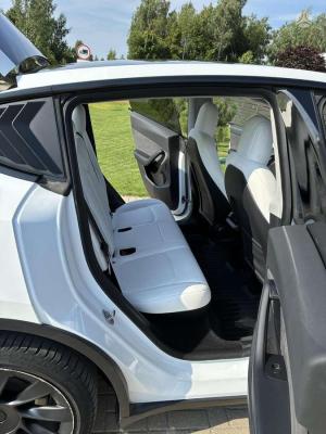 White Tesla Model Y 2022 in Vilnius, with an engine capacity of 0.00 L and mileage of 76 thousand km for 32500 €, photo 48 on AUTOMOTO.COM.LV