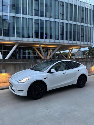 White Tesla Model Y 2022 in Vilnius, with an engine capacity of 0.00 L and mileage of 76 thousand km for 32500 €, photo 53 on AUTOMOTO.COM.LV