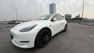 Белый Тесла Модель Y 2022 в Вильнюс, объемом двигателя 0.00 л и пробегом 180 тыс. км за 27500 €, фото 12 на AUTOMOTO.COM.LV