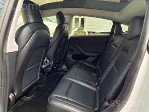 White Tesla Model Y 2022 in Riga, with an engine capacity of 0.00 L and mileage of 69 thousand km for 33750 €, photo 15 on AUTOMOTO.COM.LV