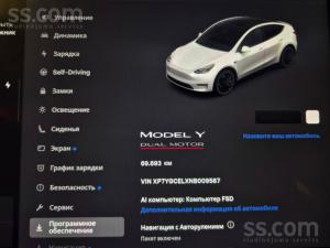 White Tesla Model Y 2022 in Riga, with an engine capacity of 0.00 L and mileage of 69 thousand km for 33750 €, photo 16 on AUTOMOTO.COM.LV