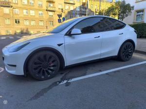 Balts Tesla Model Y 2022 Viļņa, ar dzinēja tilpumu 0.00 L un nobraukumu 106 tūkst. km par 30000 €, foto 12 vietnē AUTOMOTO.COM.LV