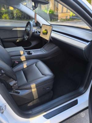 Balts Tesla Model Y 2022 Viļņa, ar dzinēja tilpumu 0.00 L un nobraukumu 106 tūkst. km par 30000 €, foto 20 vietnē AUTOMOTO.COM.LV