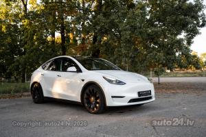 White Tesla Model Y 2022 in Tallinn, with an engine capacity of 0.00 L and mileage of 43 thousand km for 41000 €, photo 3 on AUTOMOTO.COM.LV