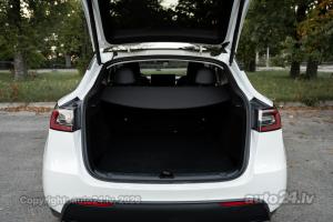 White Tesla Model Y 2022 in Tallinn, with an engine capacity of 0.00 L and mileage of 43 thousand km for 41000 €, photo 11 on AUTOMOTO.COM.LV