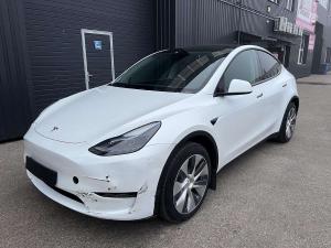White Tesla Model Y 2023 in Alytus, with an engine capacity of 0.00 L and mileage of 42 thousand km for 15900 €, photo  on AUTOMOTO.COM.LV
