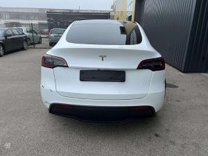 Balts Tesla Model Y 2023 Alīta, ar dzinēja tilpumu 0.00 L un nobraukumu 42 tūkst. km par 15900 €, foto 6 vietnē AUTOMOTO.COM.LV