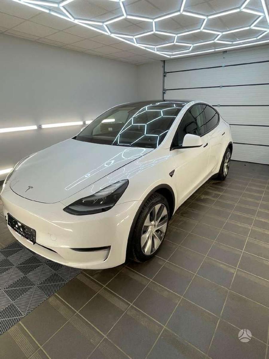 Balts Tesla Model Y 2023 Klaipėda, ar dzinēja tilpumu 0.00 L un nobraukumu 200 tūkst. km par 17200 €, foto 1 vietnē AUTOMOTO.COM.LV
