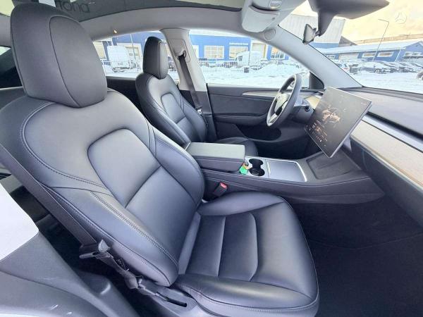 White Tesla Model Y 2023 in Siauliai, with an engine capacity of 0.00 L and mileage of 55 thousand km for 23900 €, photo 11 on AUTOMOTO.COM.LV